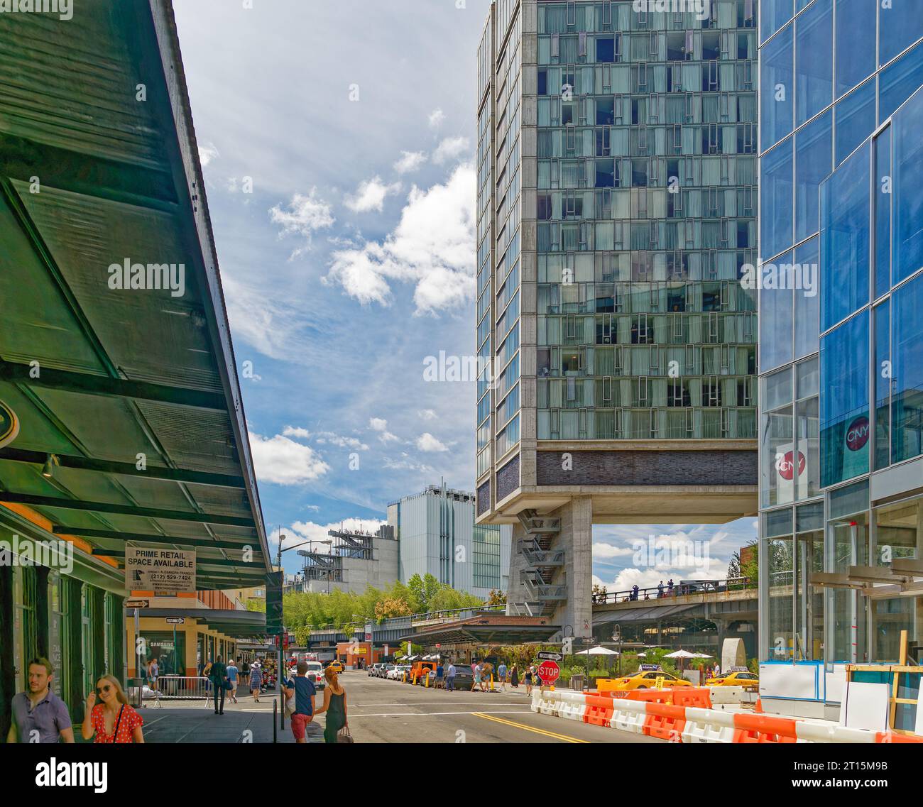 The Standard hotel’s glass-faced tower straddles High Line park on ...