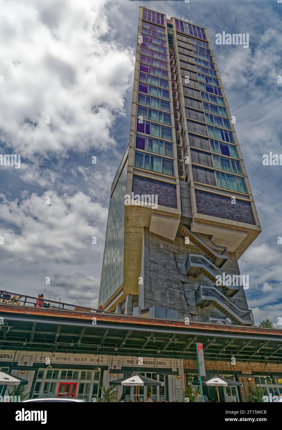 The Standard hotel’s glass-faced tower straddles High Line park on ...