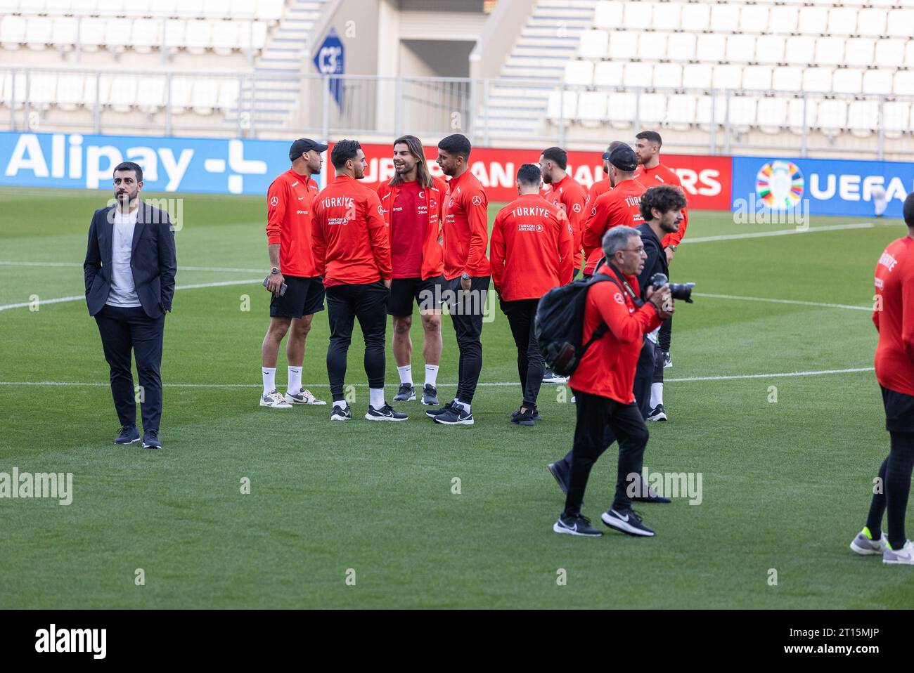 Osijek, Croatia. 11th Oct, 2023. Players of Turkey inspects the pitch ...