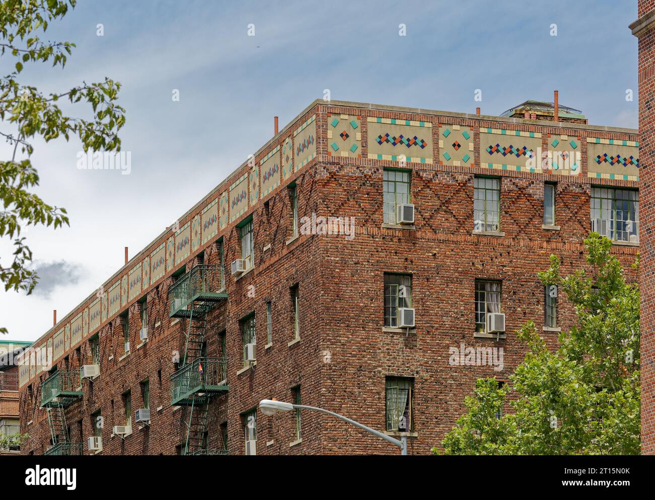 80 Barrow Street, a brown brick building topped by a polychrome terra ...