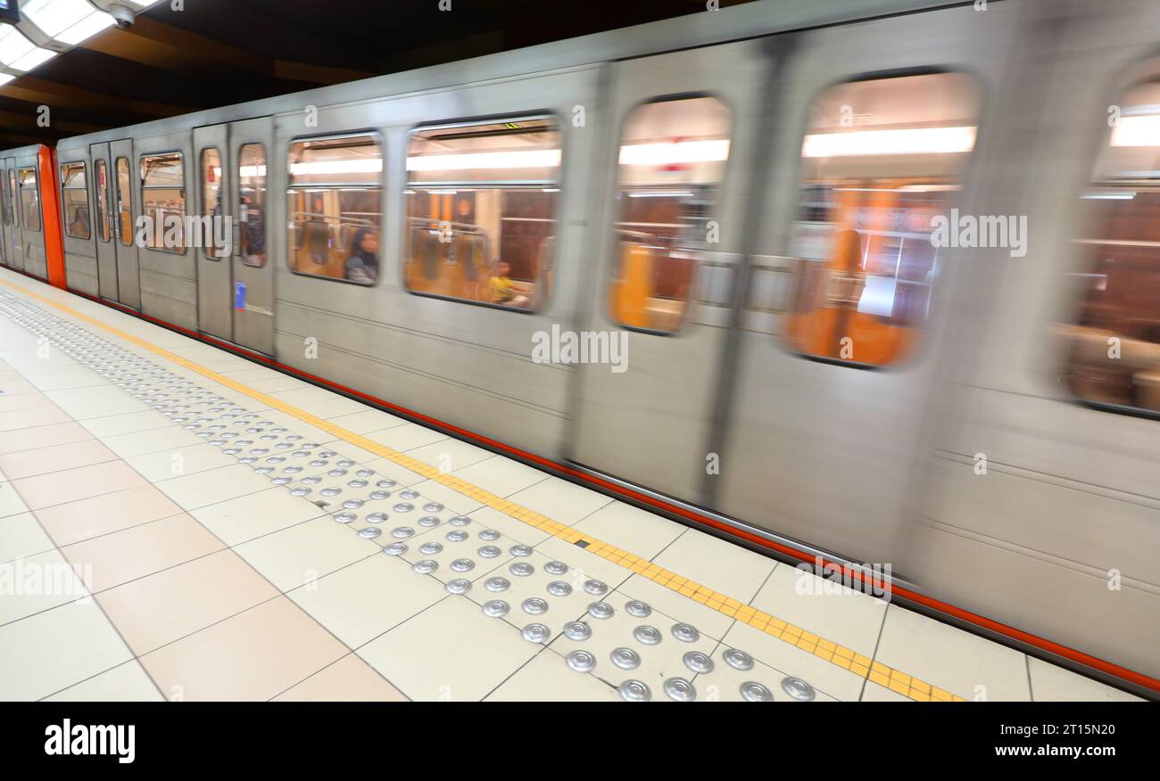 Subway car running fast with an almost blurred motion affect in the ...