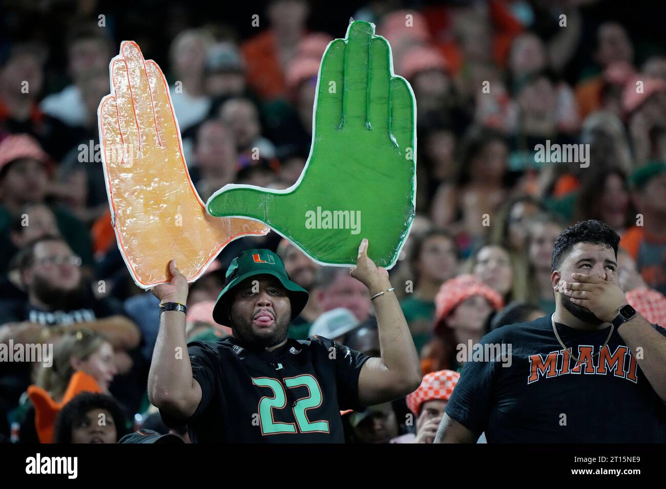 Miami fans look on during the first half of an NCAA college football ...