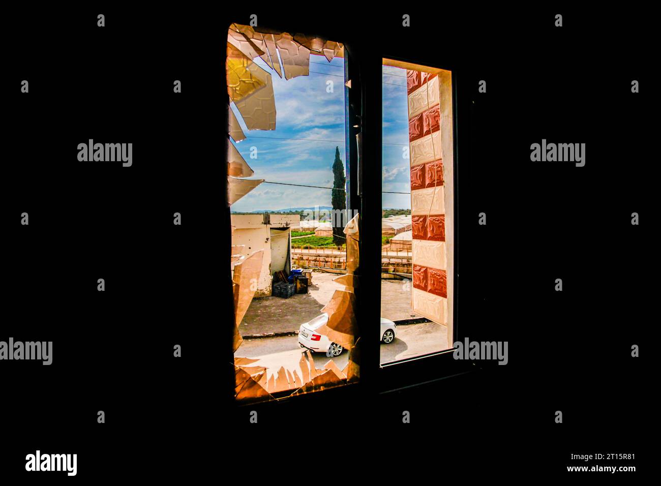 Tulkarm, Palestine. 11th Oct, 2023. View of a house window damaged by ...