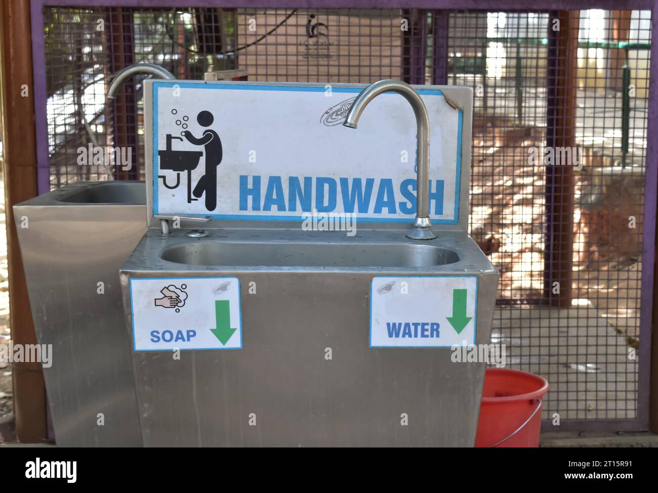 A closeup picture of a Hand wash steel basin installed in a Urban Park ...