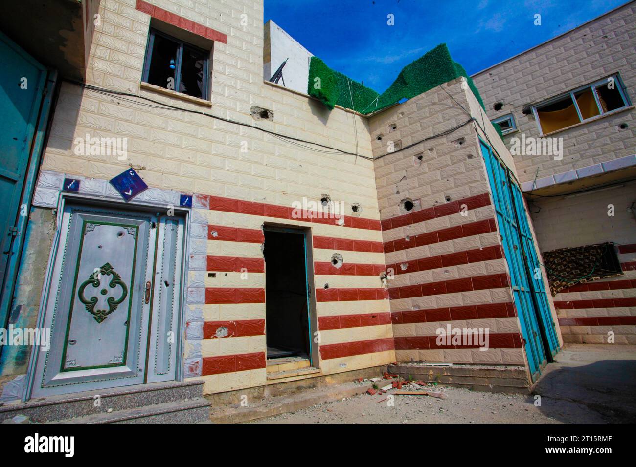 Tulkarm, Palestine. 11th Oct, 2023. A house seen filled with fragments ...