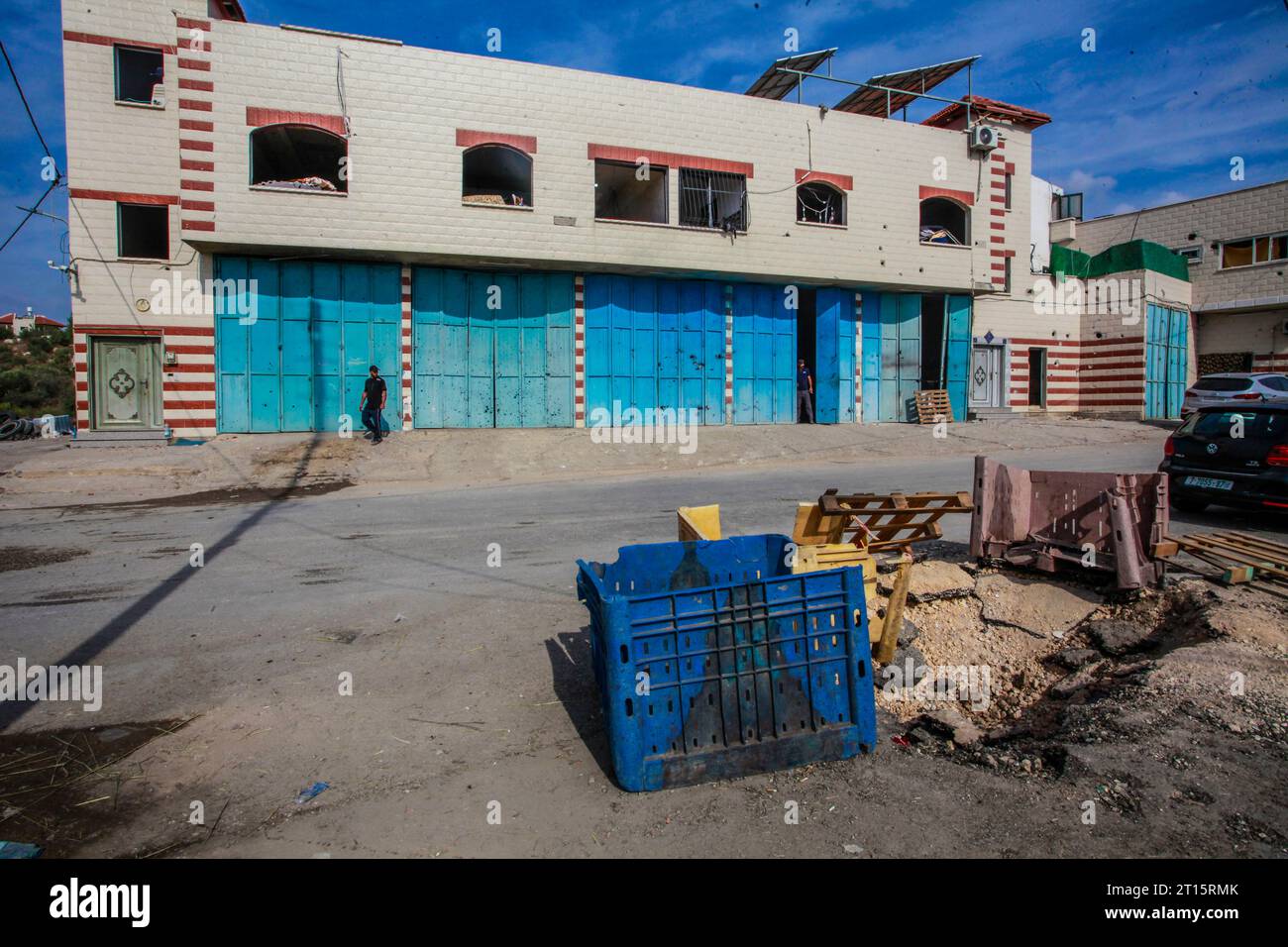 Tulkarm, Palestine. 11th Oct, 2023. A house seen filled with fragments ...