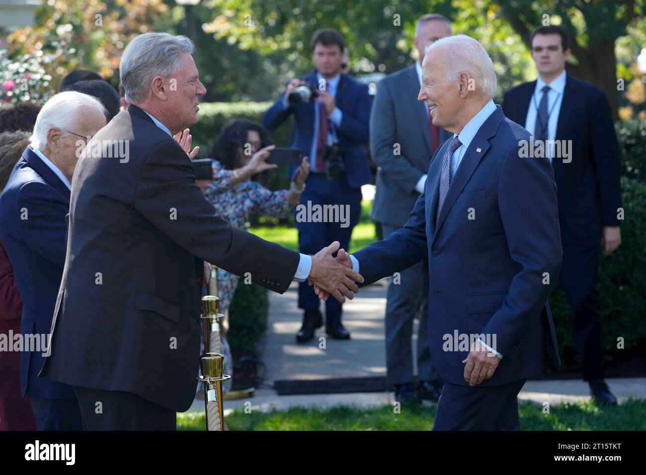 President Joe Biden shakes hands with Rep. Frank Pallone, D-N.J., in ...