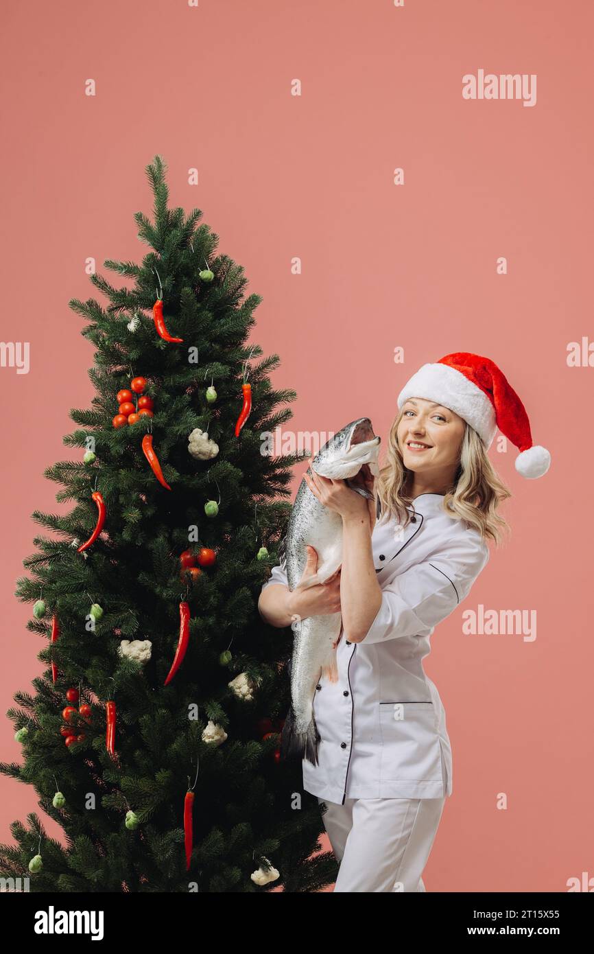 Woman fish in hands hi-res stock photography and images - Alamy