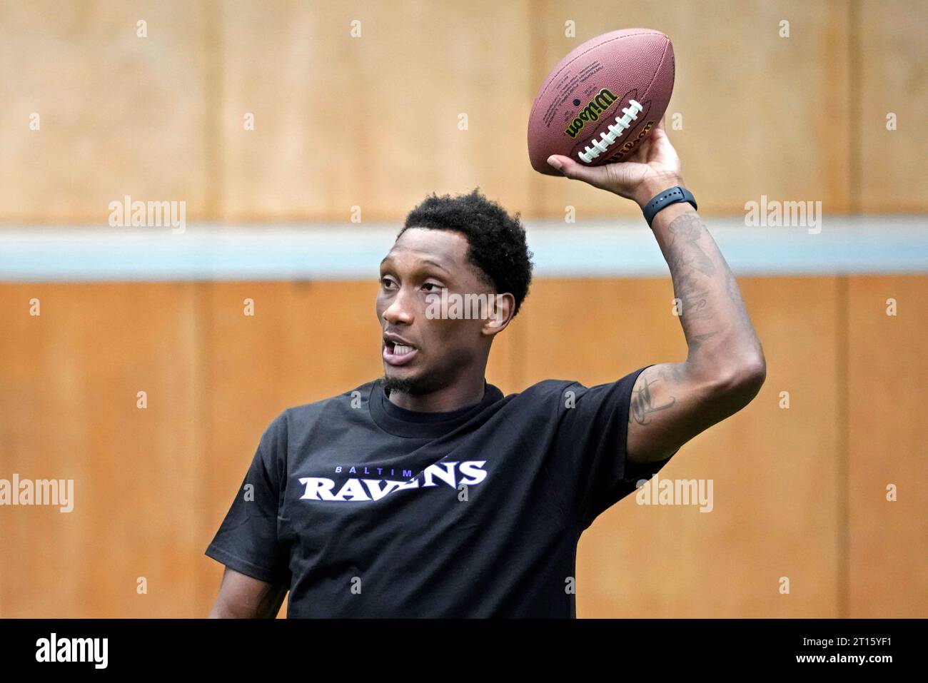 Baltimore Ravens wide receiver Sean Ryan demonstrates his skill during ...