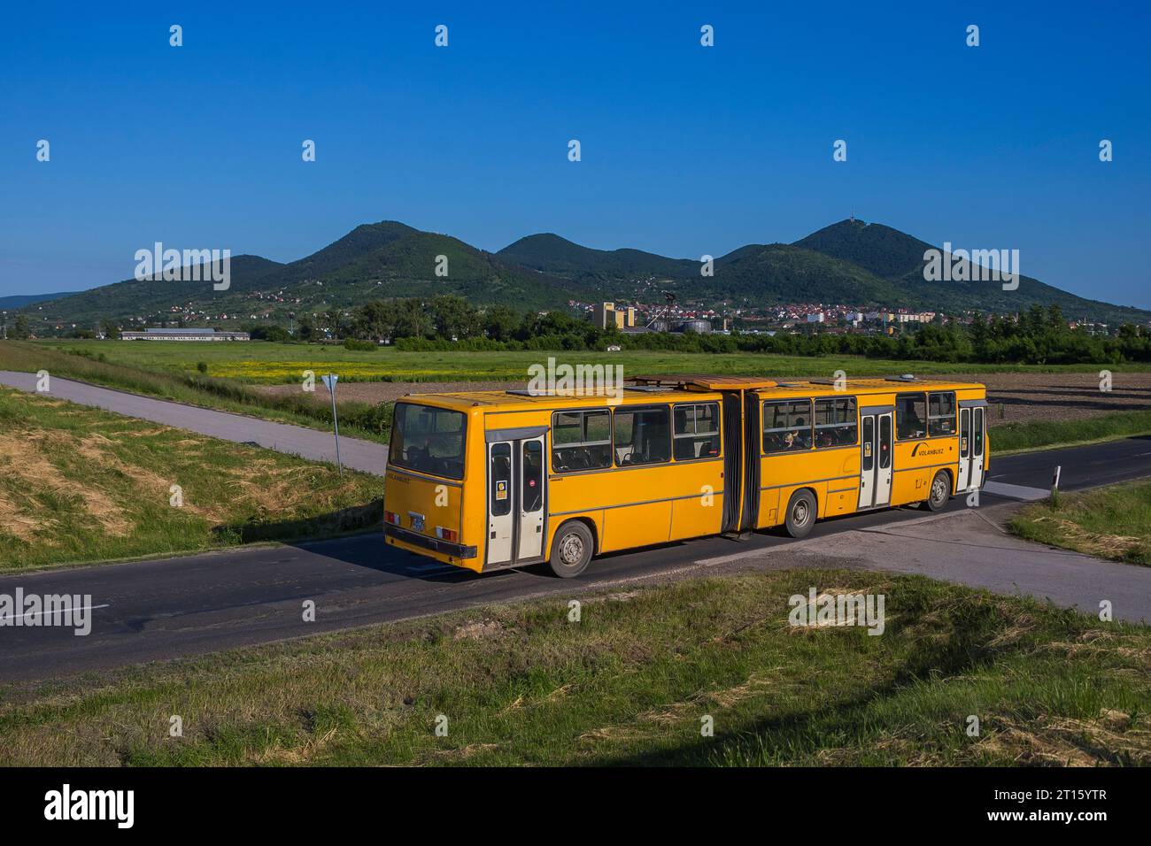4.06.2021. Hungary, road to Satoraljaujhely. Ikarus 280 with the city ...