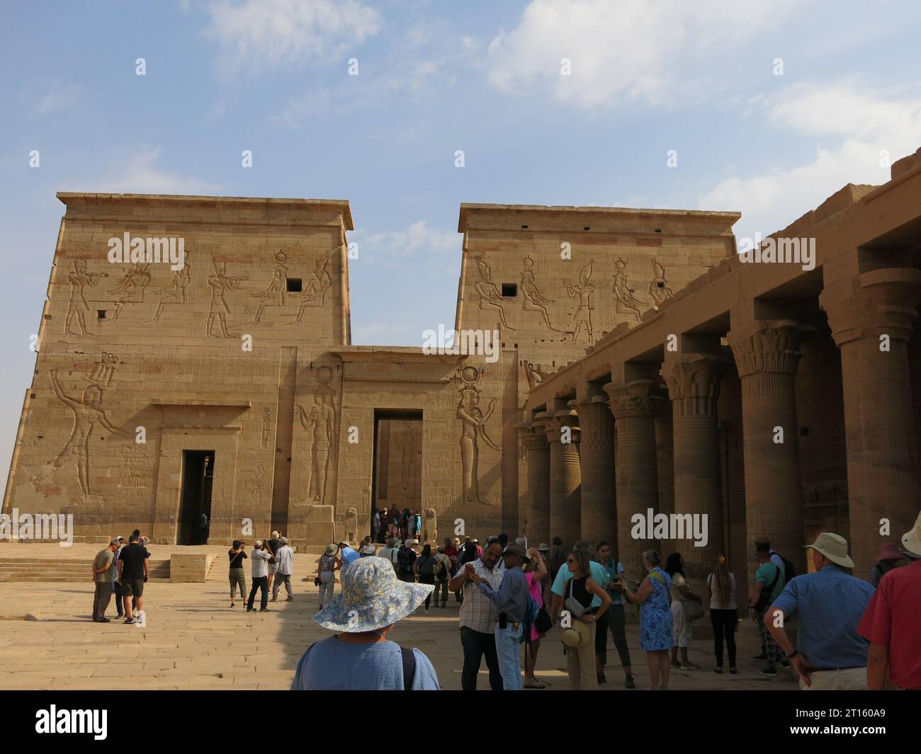 Tourists visit the Philae Temple complex, dedicated to the goddess Isis ...