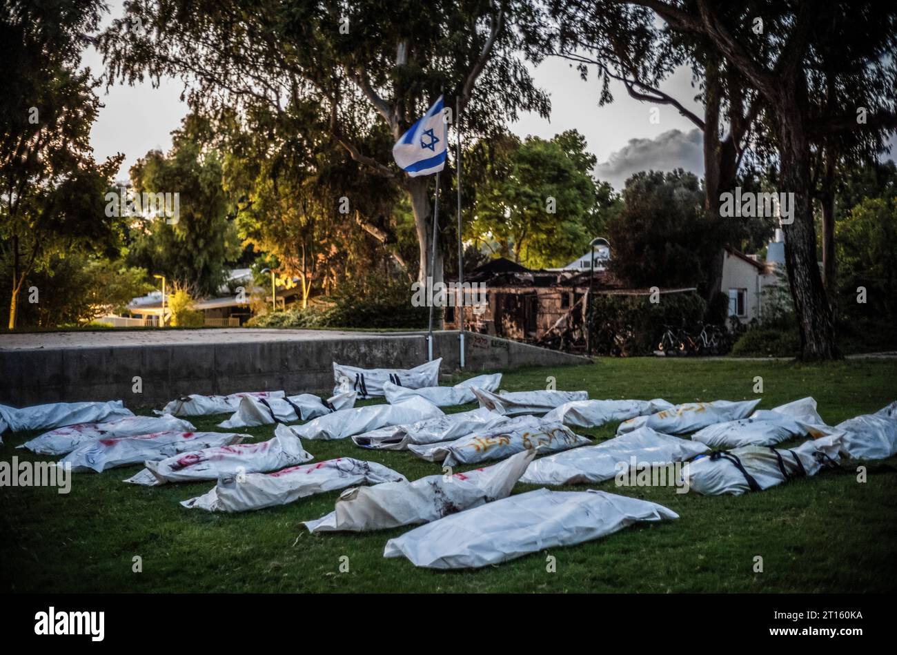 11 October 2023, Israel, Kibbutz Be·eri: The bodies of Palestinian ...