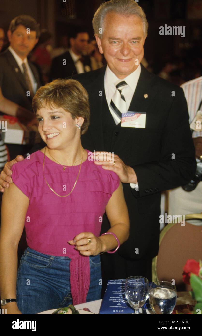 Summer Olympics, USA. , . athlete MARY LOU RETTON with coach Bela ...