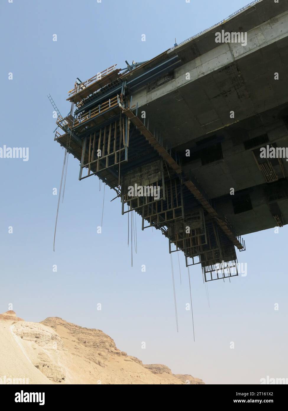 Looking up underneath the overhanging span of the new road bridge being ...