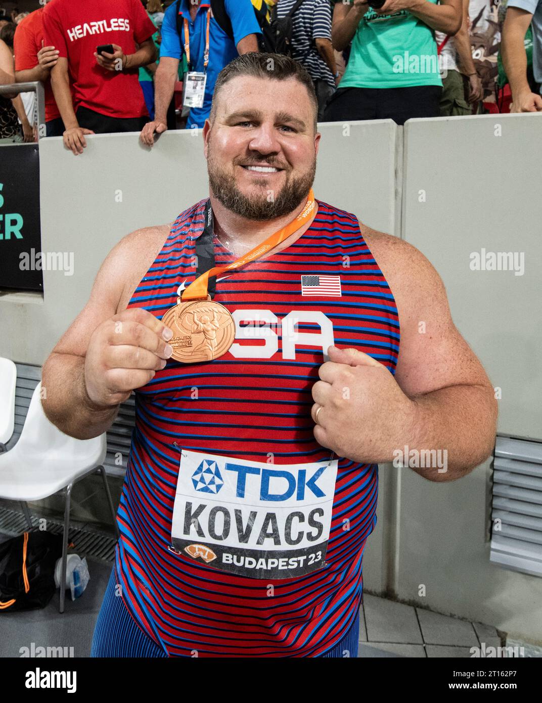 Joe Kovacs of the USA celebrates after winning a bronze medal in the ...