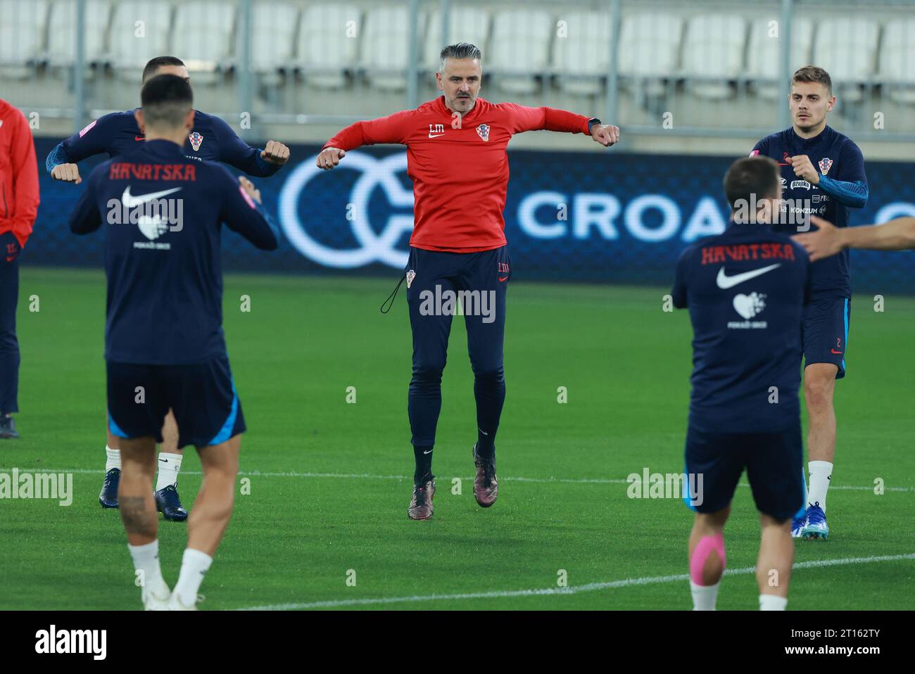 Osijek, Croatia. 11th Oct, 2023. Fitness coach of Croatia Luka ...