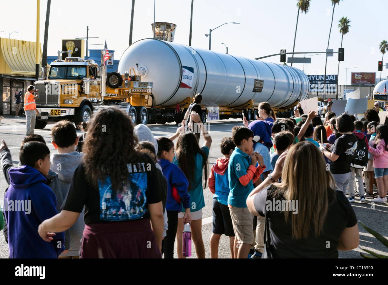 Students from the Alexander Science Center School cheer as two rocket ...