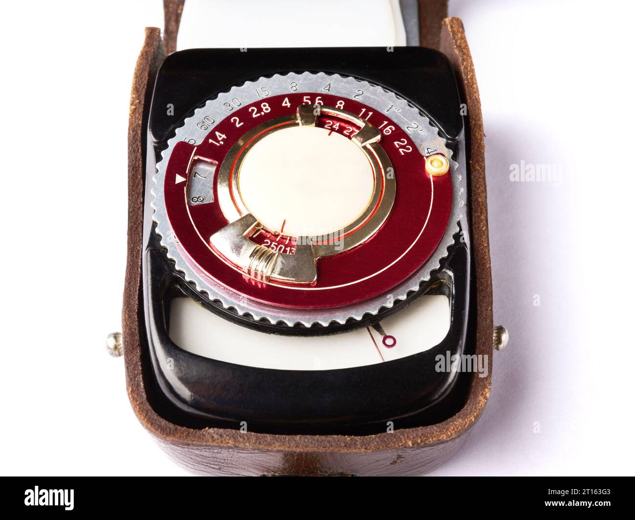 Old vintage photo exposure meter isolated white Stock Photo - Alamy