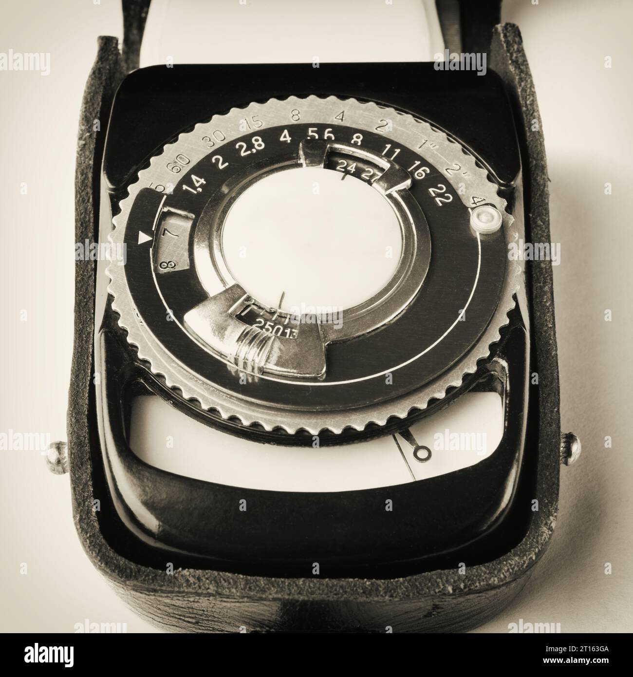 Old vintage photo exposure meter isolated white Stock Photo - Alamy