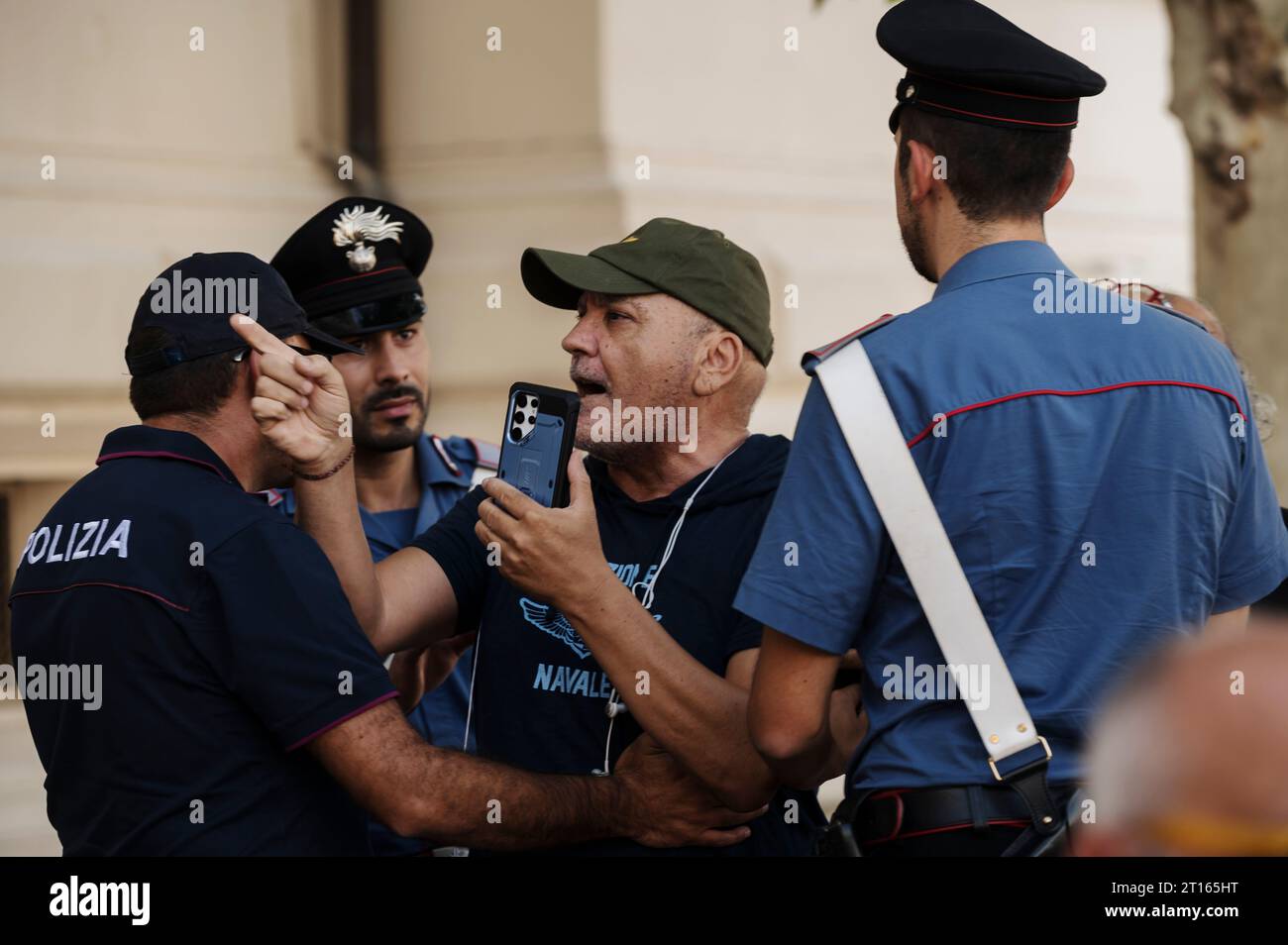 Reggio Calabria, Catanzaro, Italy. 11th Oct, 2023. Police seen holding ...