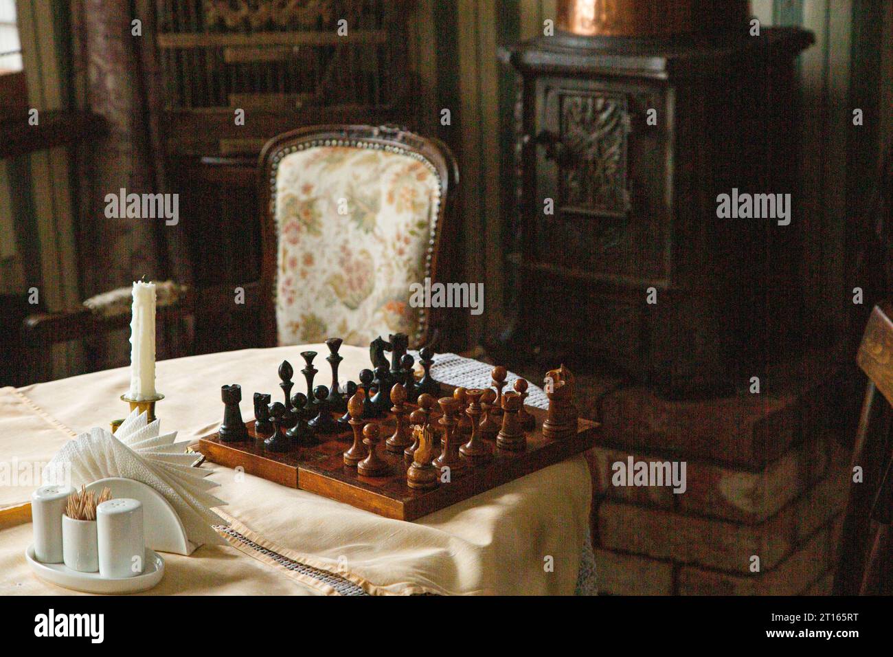 wooden chess pieces are in the interior Stock Photo - Alamy
