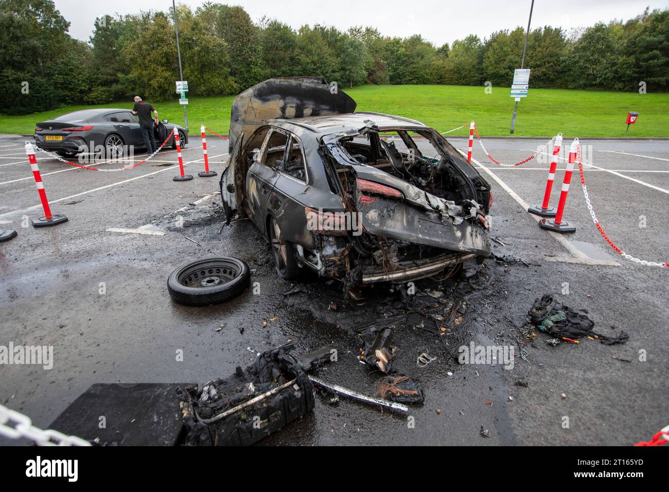 The burnt out shell of an Audi estate car at Tibshelf Service station ...
