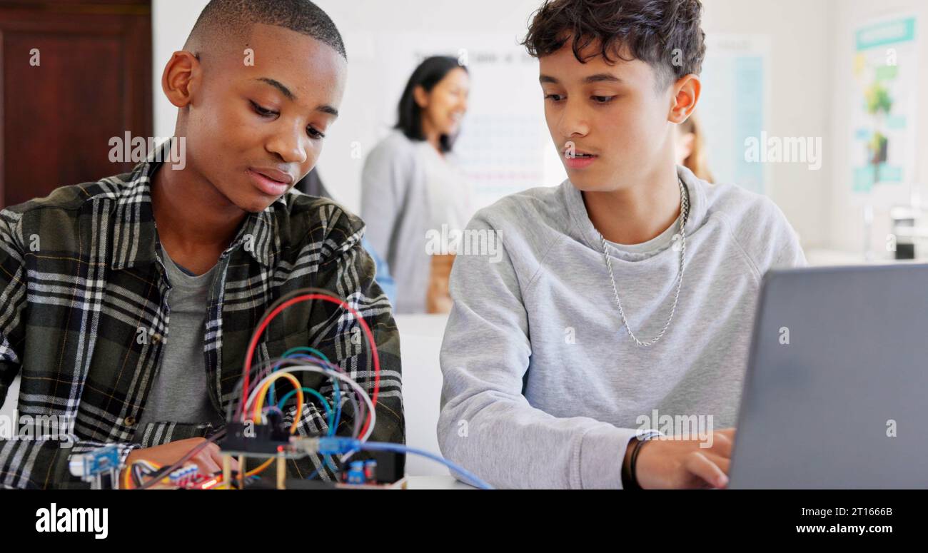 Robotics, education and students with laptop at school learning coding, future or programming ...