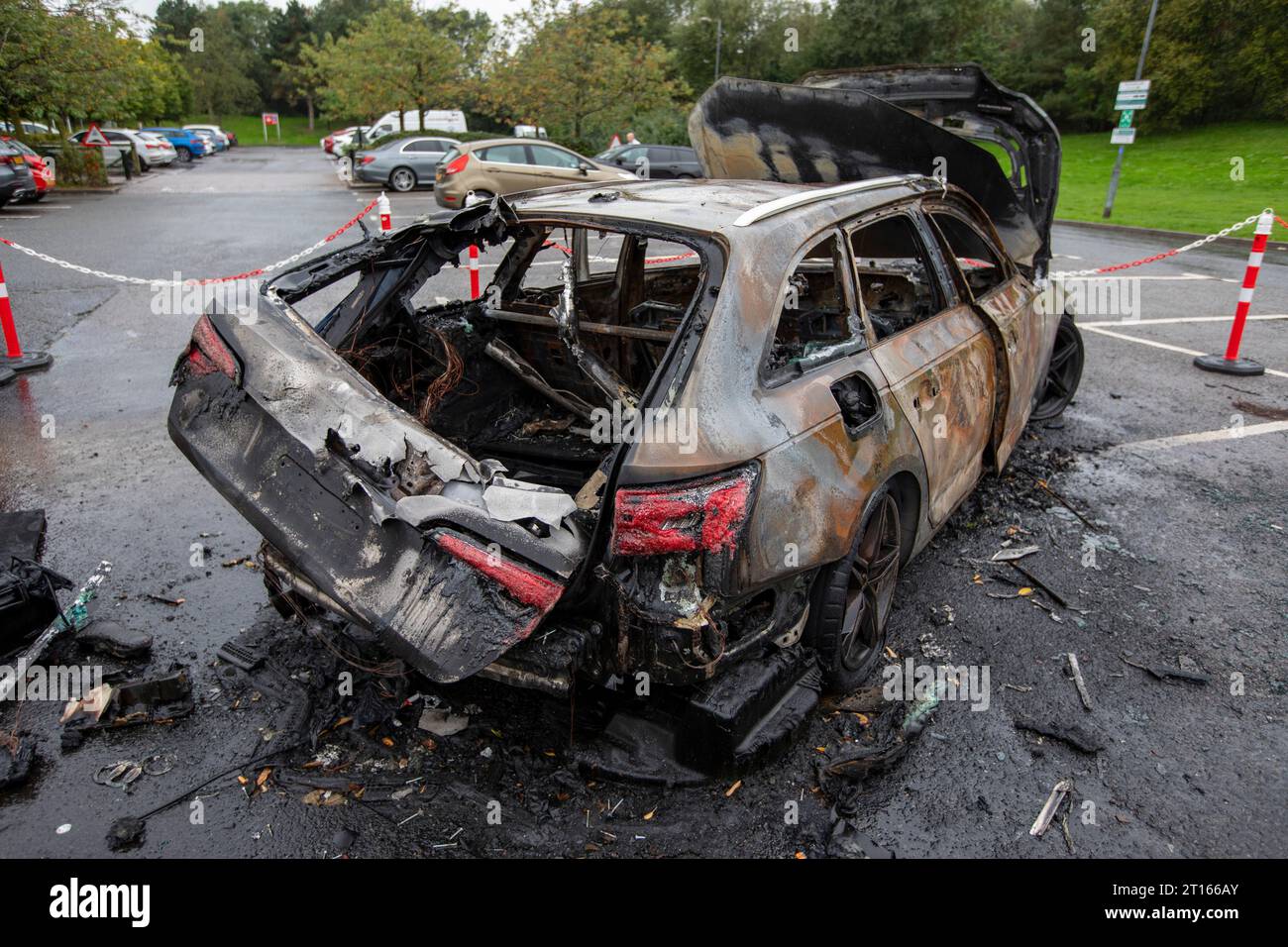 The burnt out shell of an Audi estate car at Tibshelf Service station ...