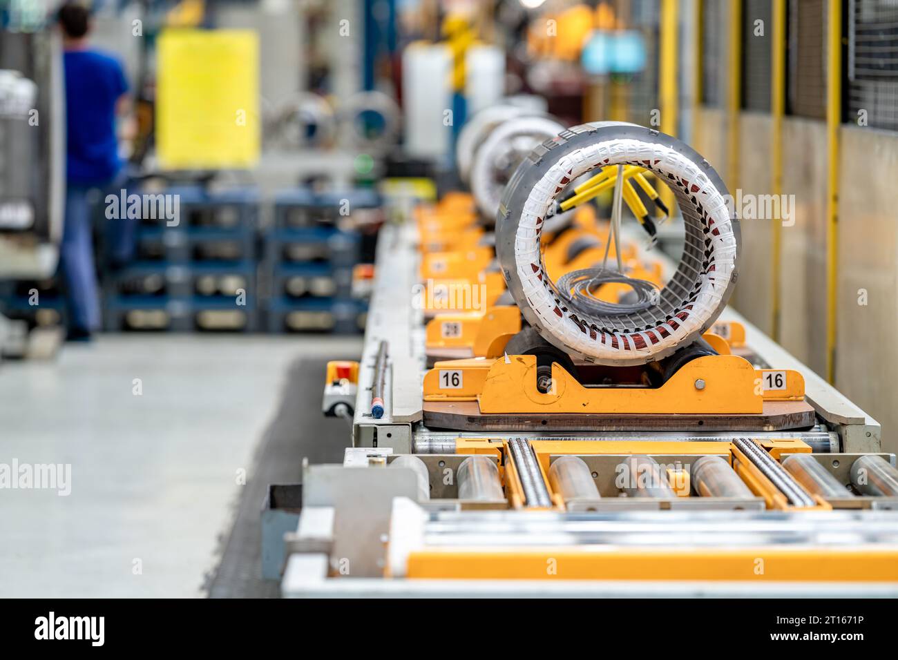 detail of the electric motor on the production line in the factory ...