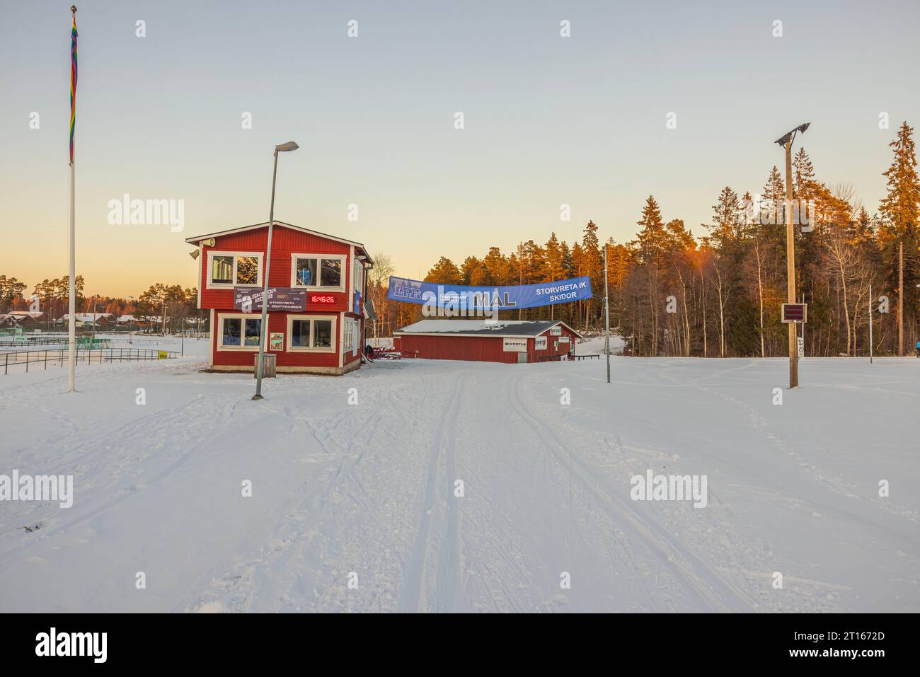 View of winter landscape with ski tracks and building of ski sports ...