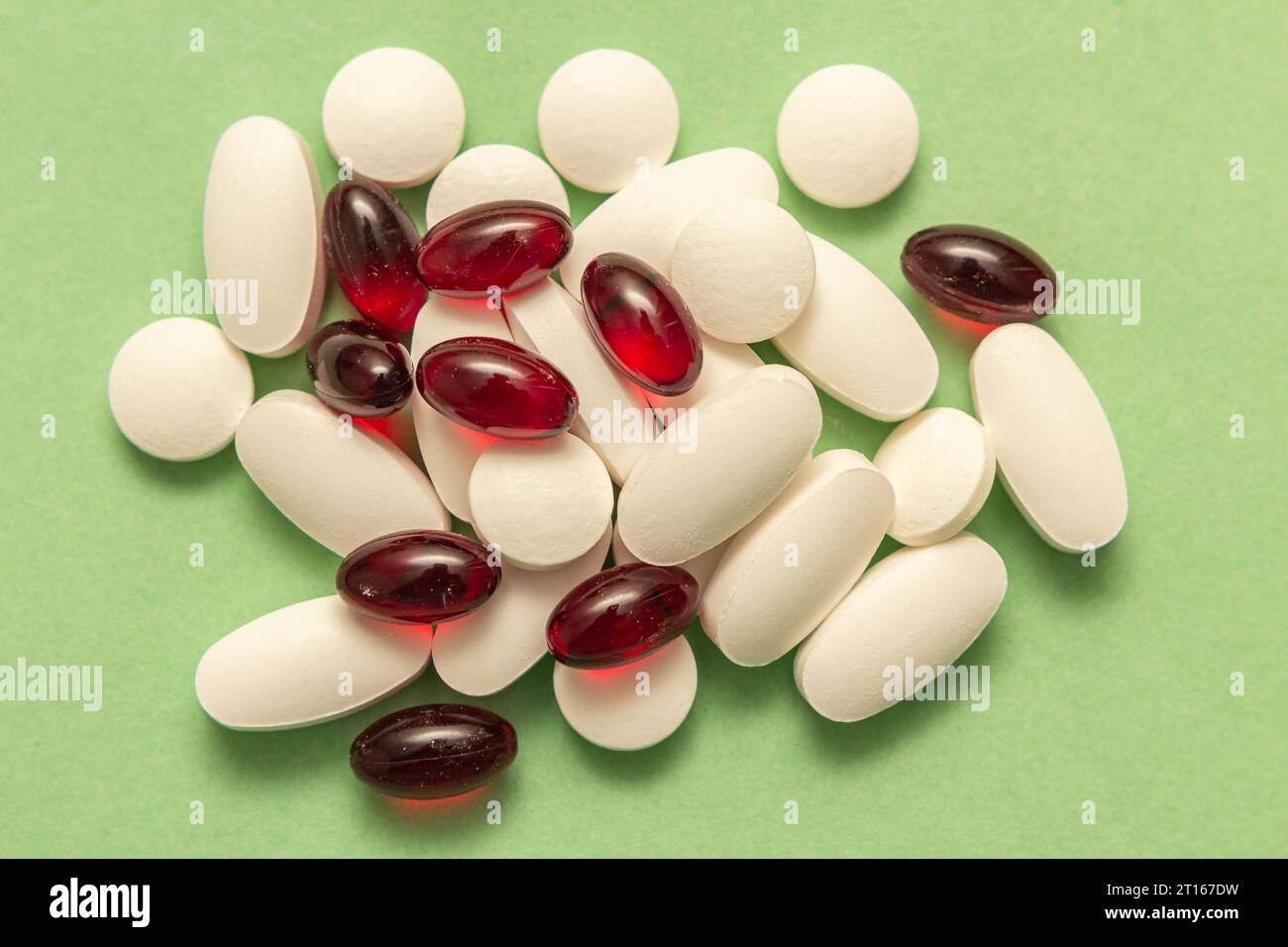 Goiânia, Goias, Brazil – October 10, 2023: A set of white pills and red ...