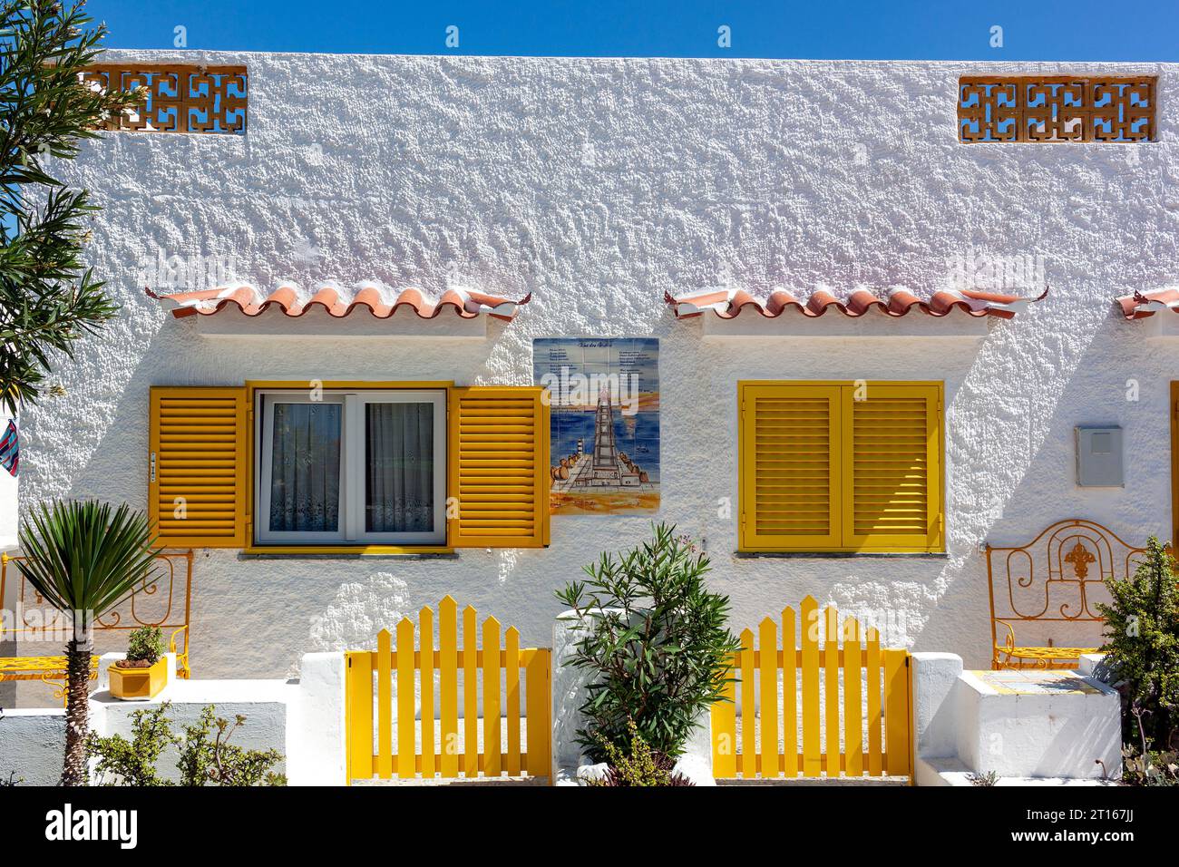 Beautiful white and yellow Portuguese house on Farol Island in Faro ...