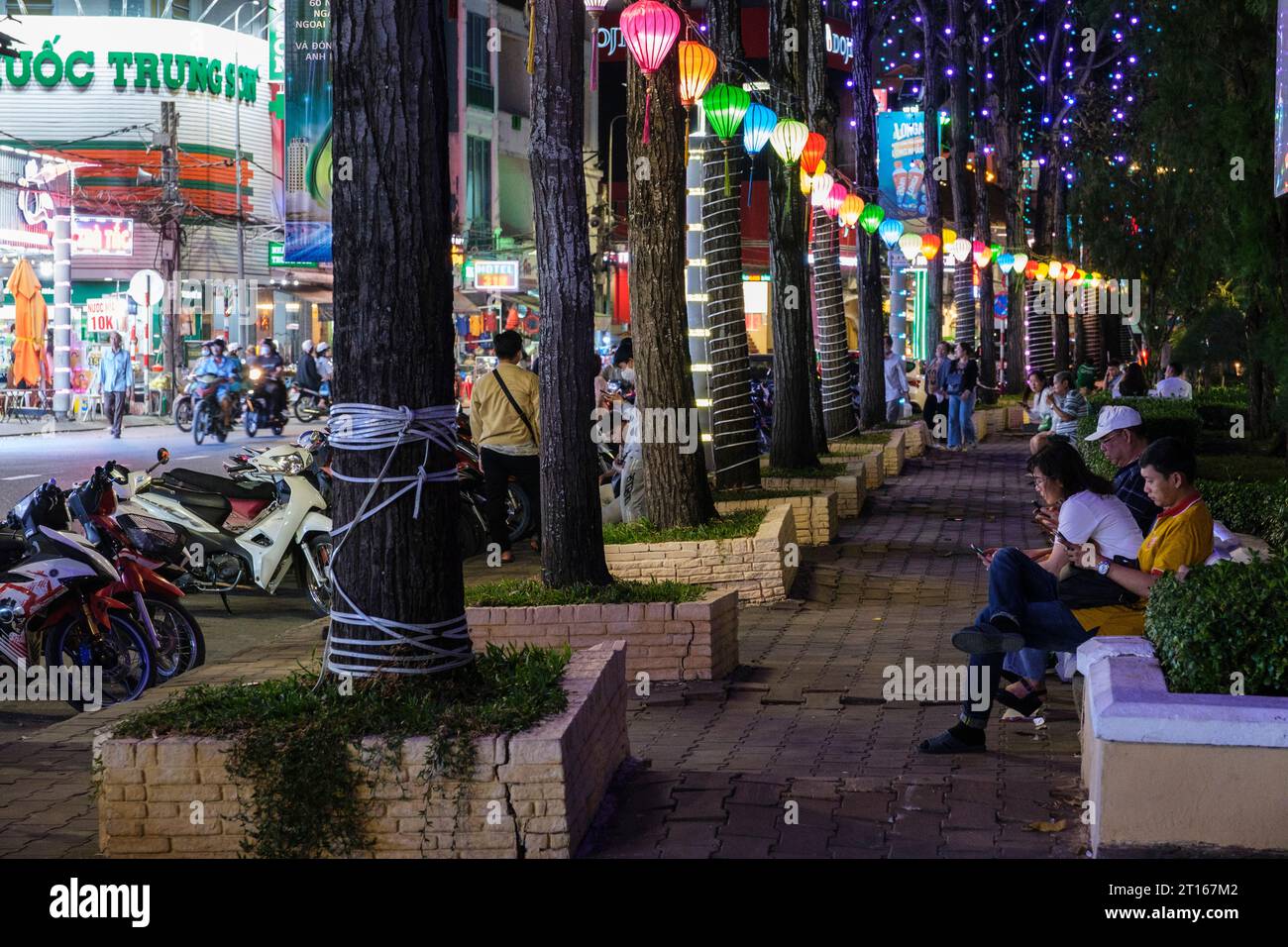Hai Ba Trung Street Sidewalk, Can Tho, Vietnam. Nighttime Street Scene ... Hai Ba Trung Street Sidewalk, Can Tho, Vietnam. Nighttime Street Scene ...