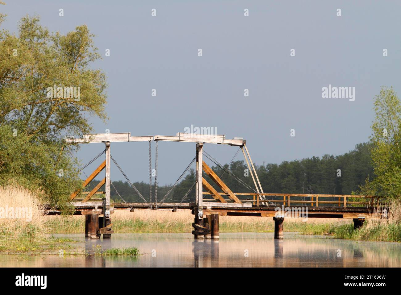 Replica of the historic wooden drawbridge over the river Trebel near ...