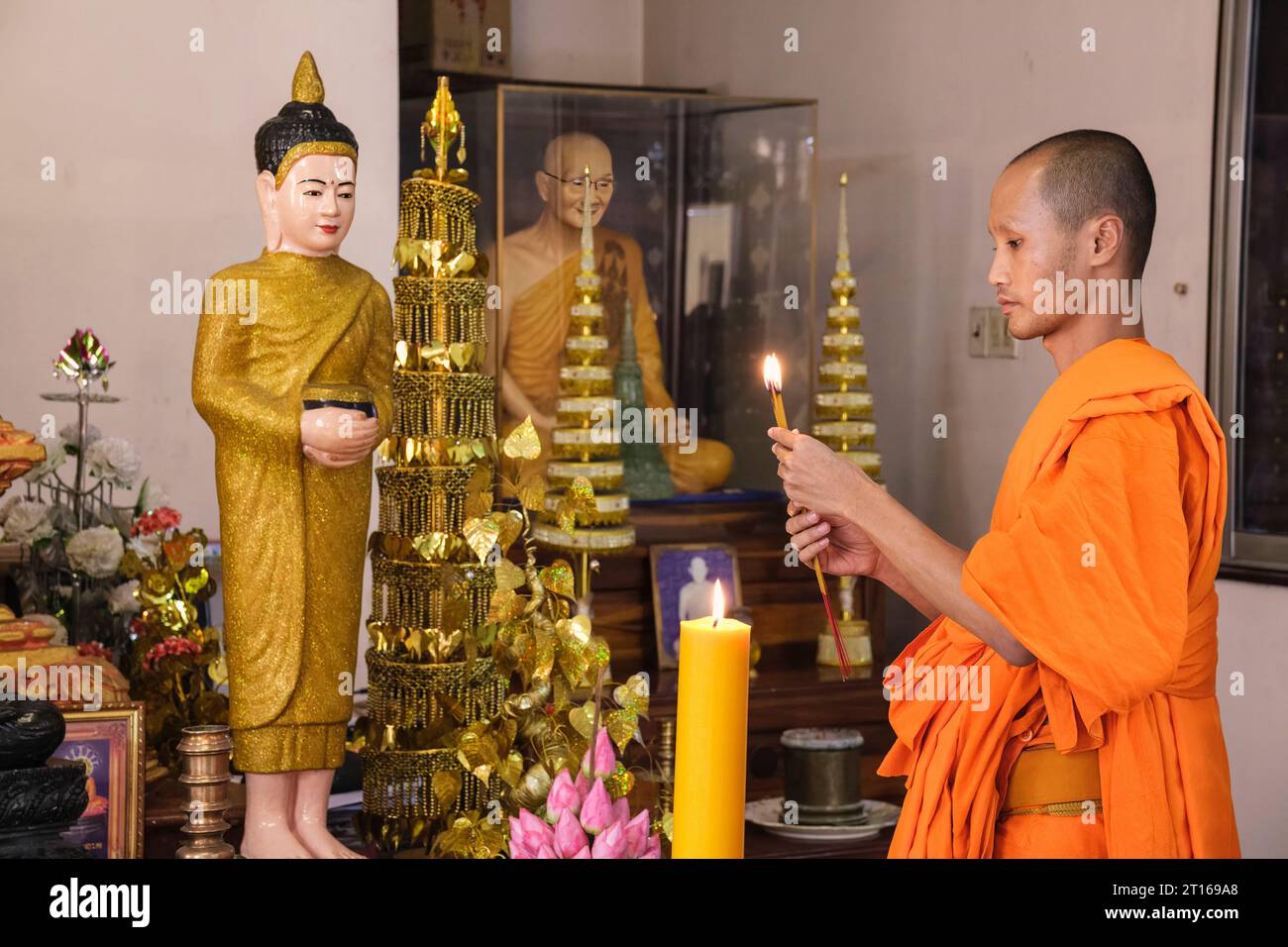 Can Tho, Vietnam. Buddhist Khmer Monk Lighting Incense Sticks, Munirensay Buddhist Pagoda Stock ...