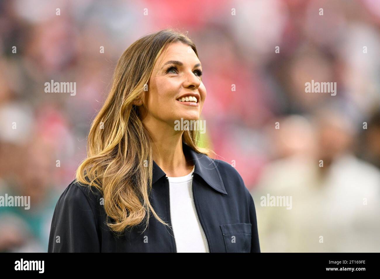 DAZN sports presenter Laura Wontorra, portrait, smiles, look up ...