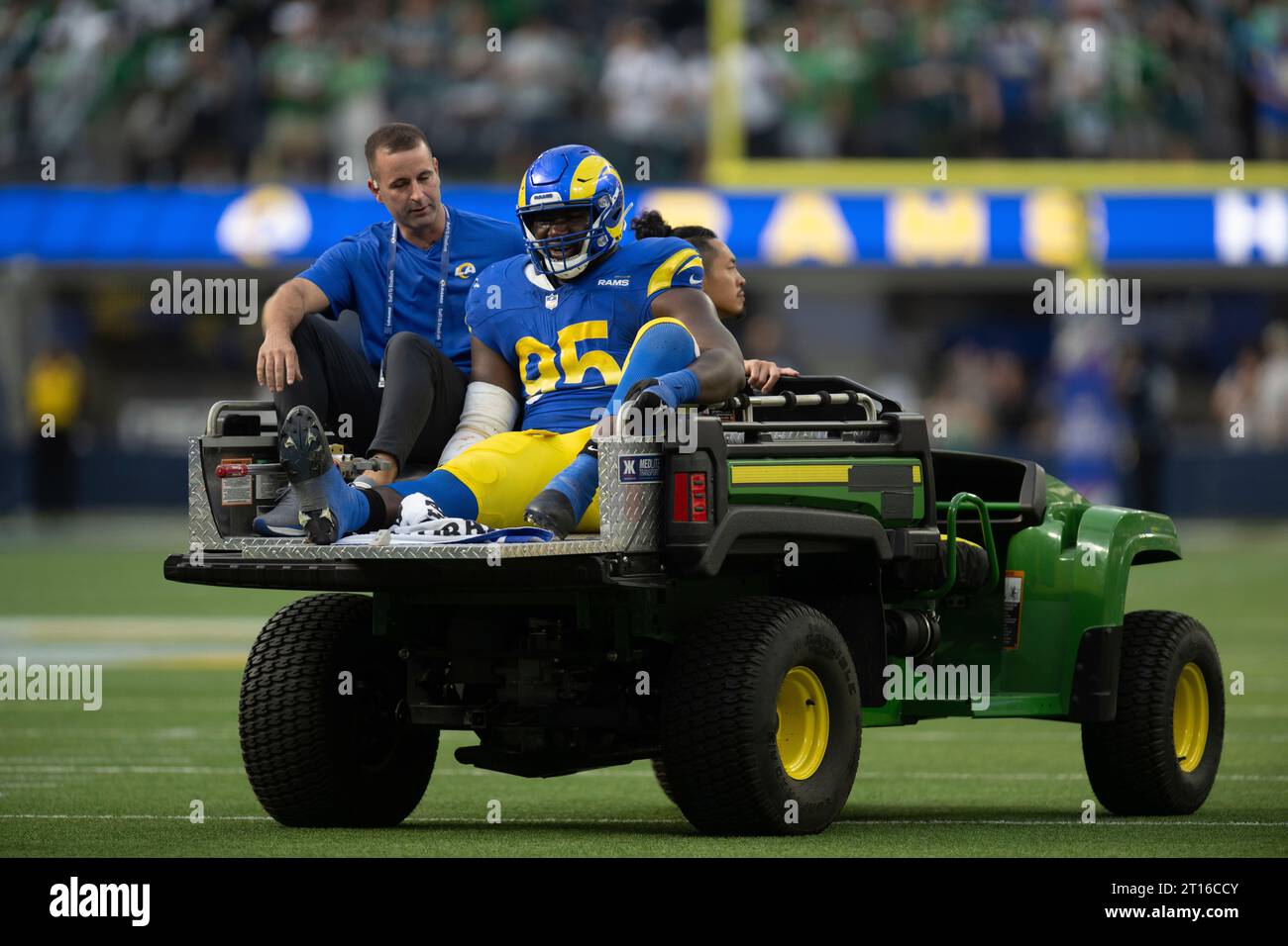 Los Angeles Rams defensive tackle Bobby Brown III (95) carted off the ...