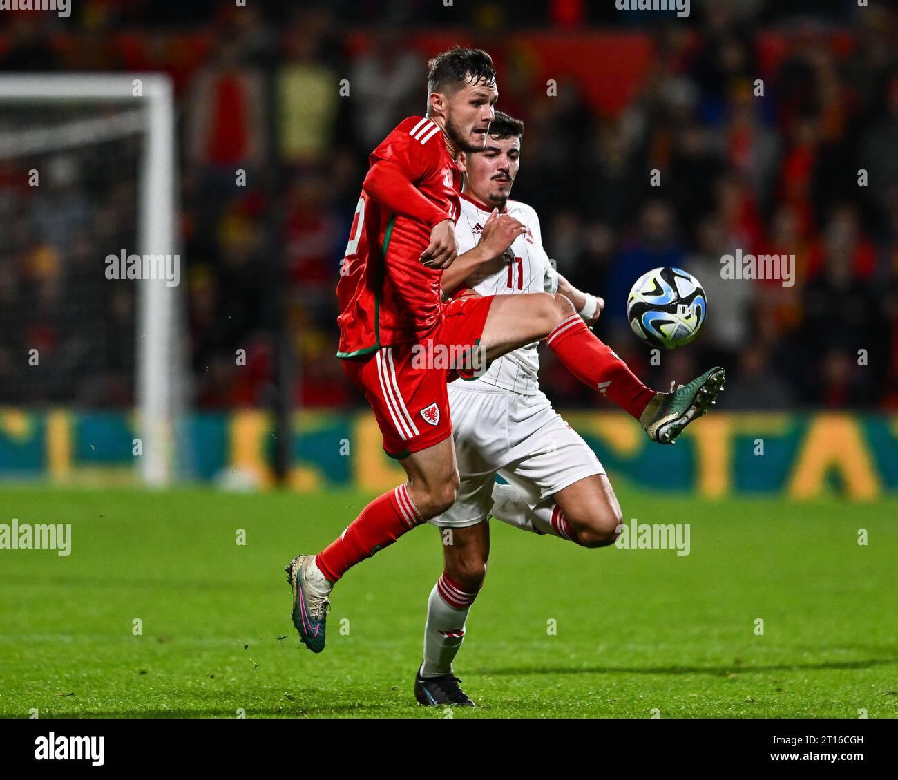 Liam Cullen of Wales controls the ball during the International ...