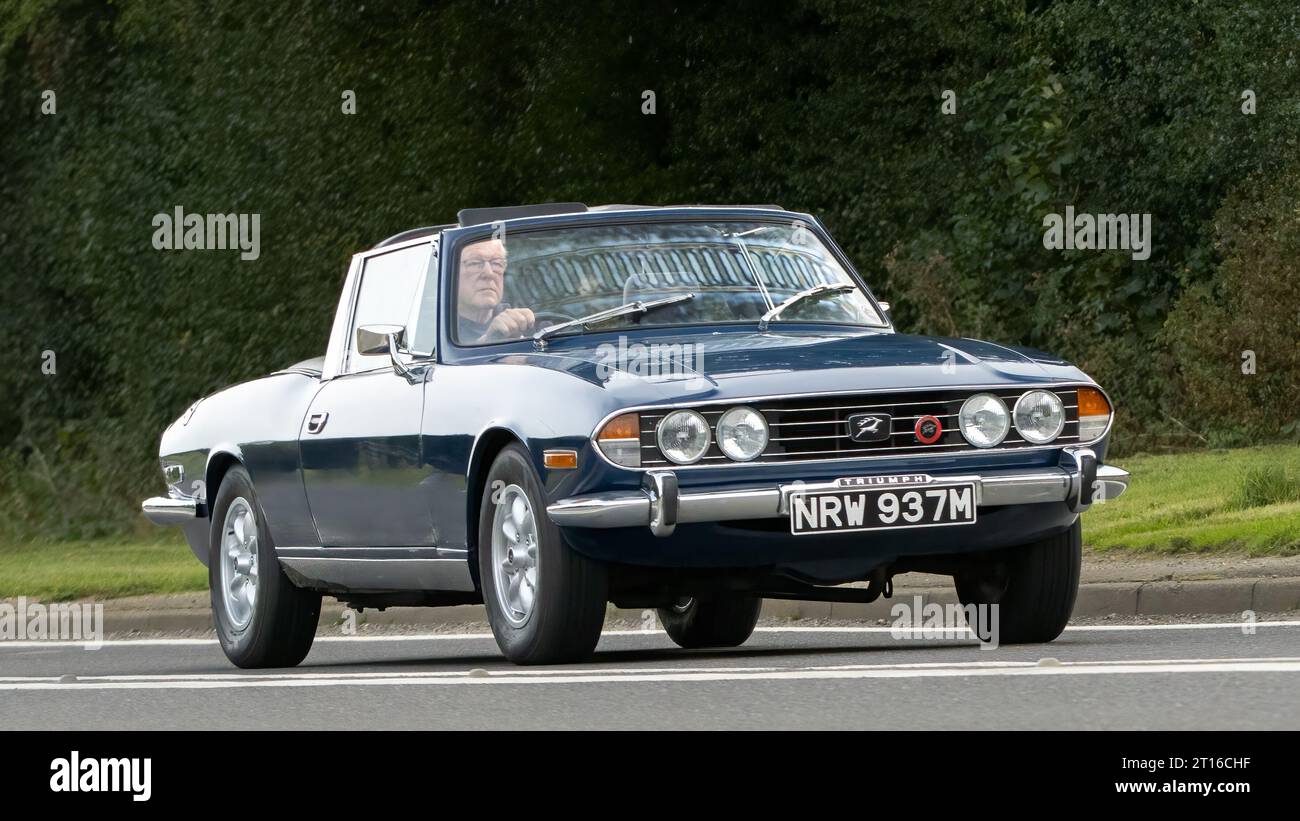 Bicester,Oxon.,UK - Oct 8th 2023: 1974 Triumph Stag classic car driving ...