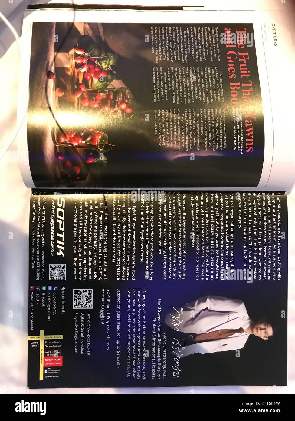 a glossy magazine double page spread of 2 pages sideway on with an ...