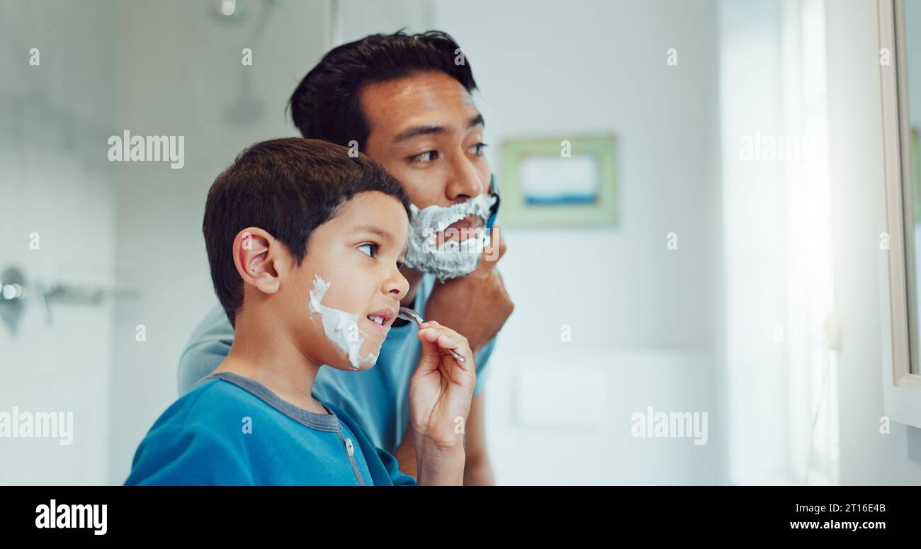 Dad, boy and learning to shave in bathroom with facial cream, skincare ...
