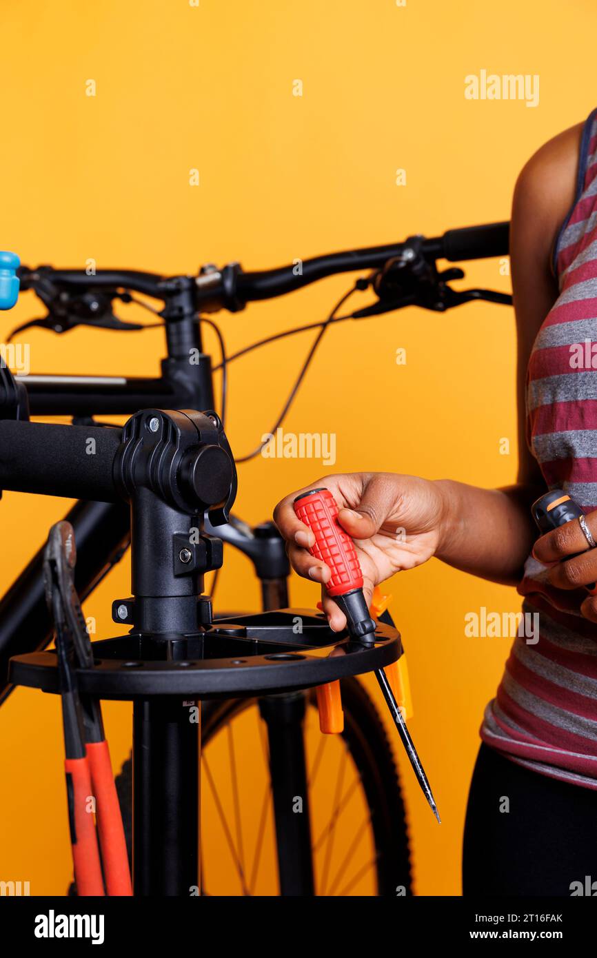 Detailed shot of african american person choosing expert work tools for ...