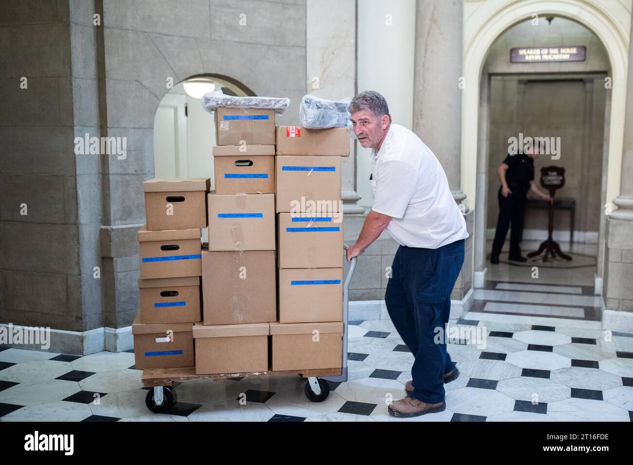 Washington, D.C, USA. 11th Oct, 2023. A worker removes boxes from the ...