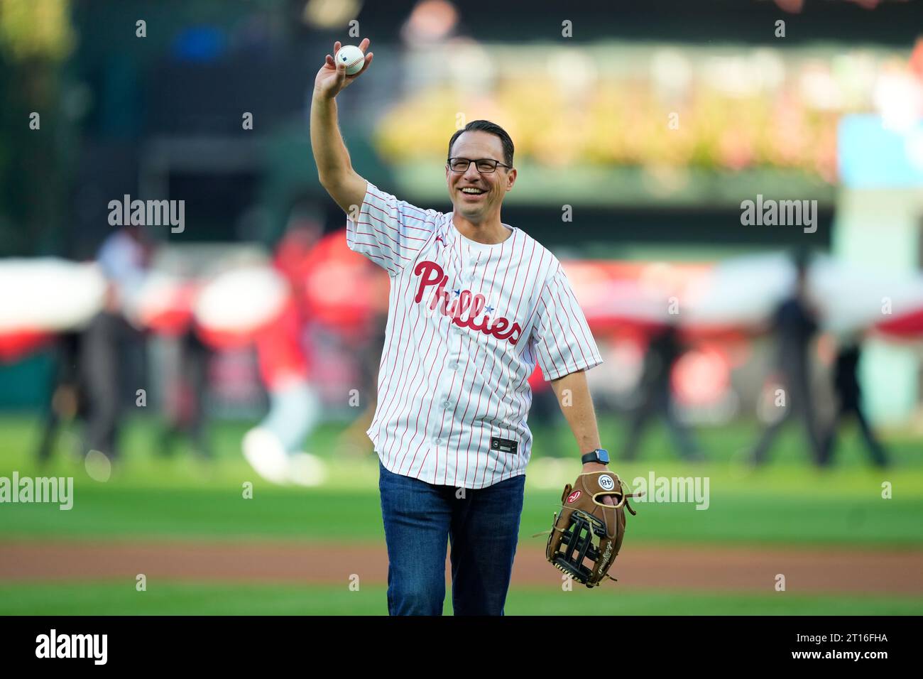 Pennsylvania Gov. Josh Shapiro throws the ceremonial first pitch before ...