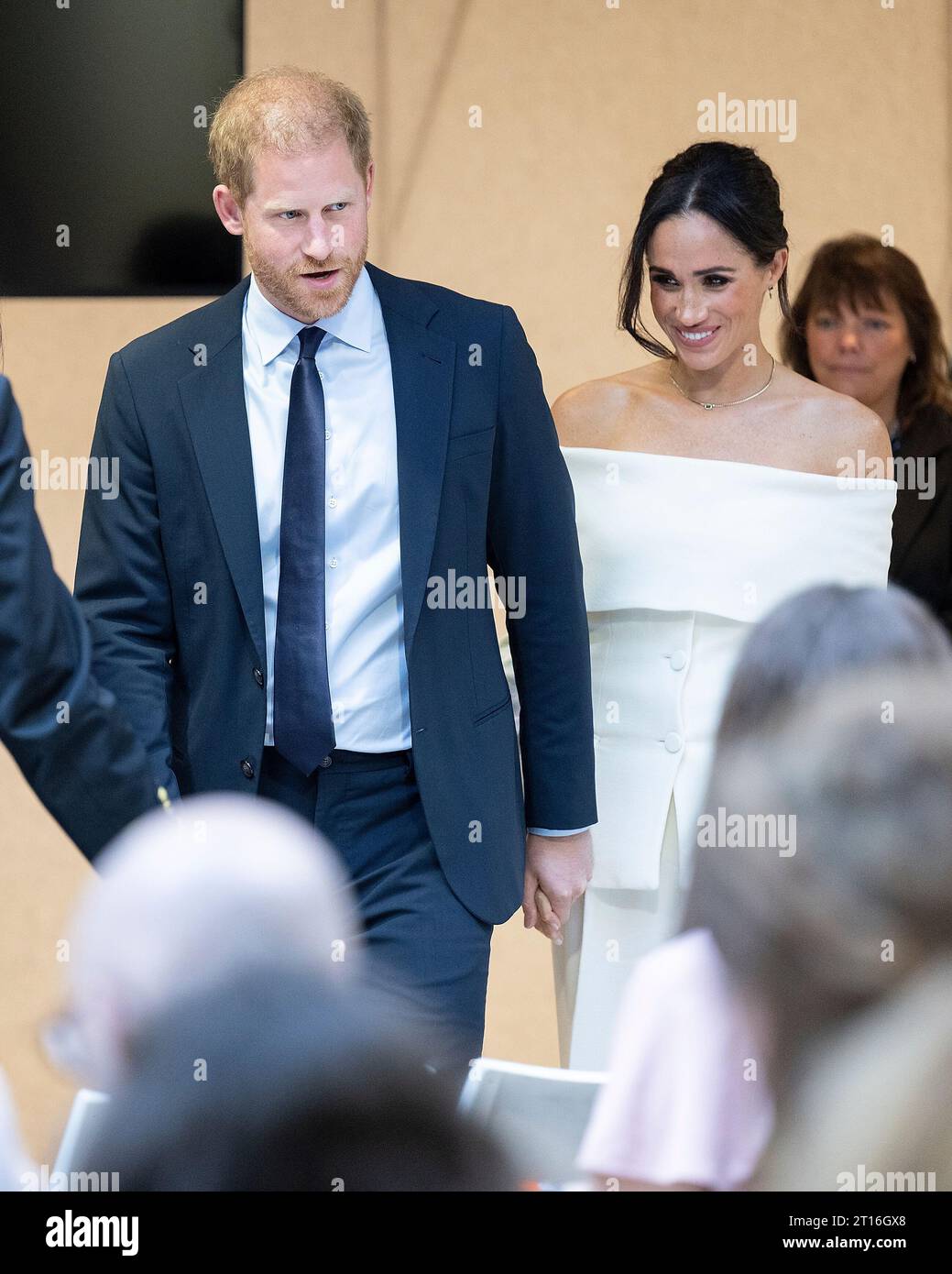 Britain's Prince Harry, The Duke of Sussex, left, and Meghan, Duchess ...