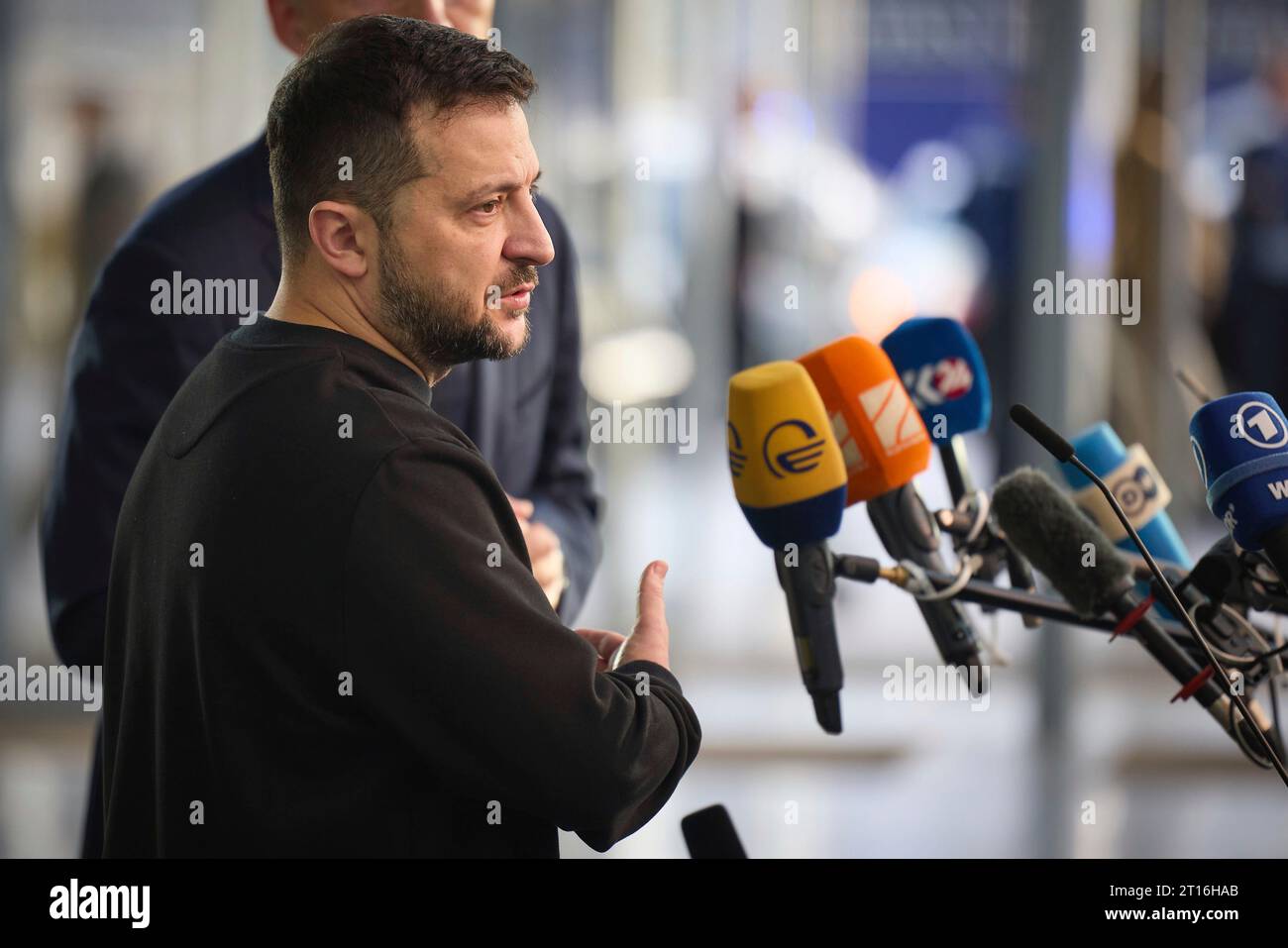 Brussels, Belgium. 11th Oct, 2023. Ukrainian President Volodymyr Zelenskyy responds to a ...