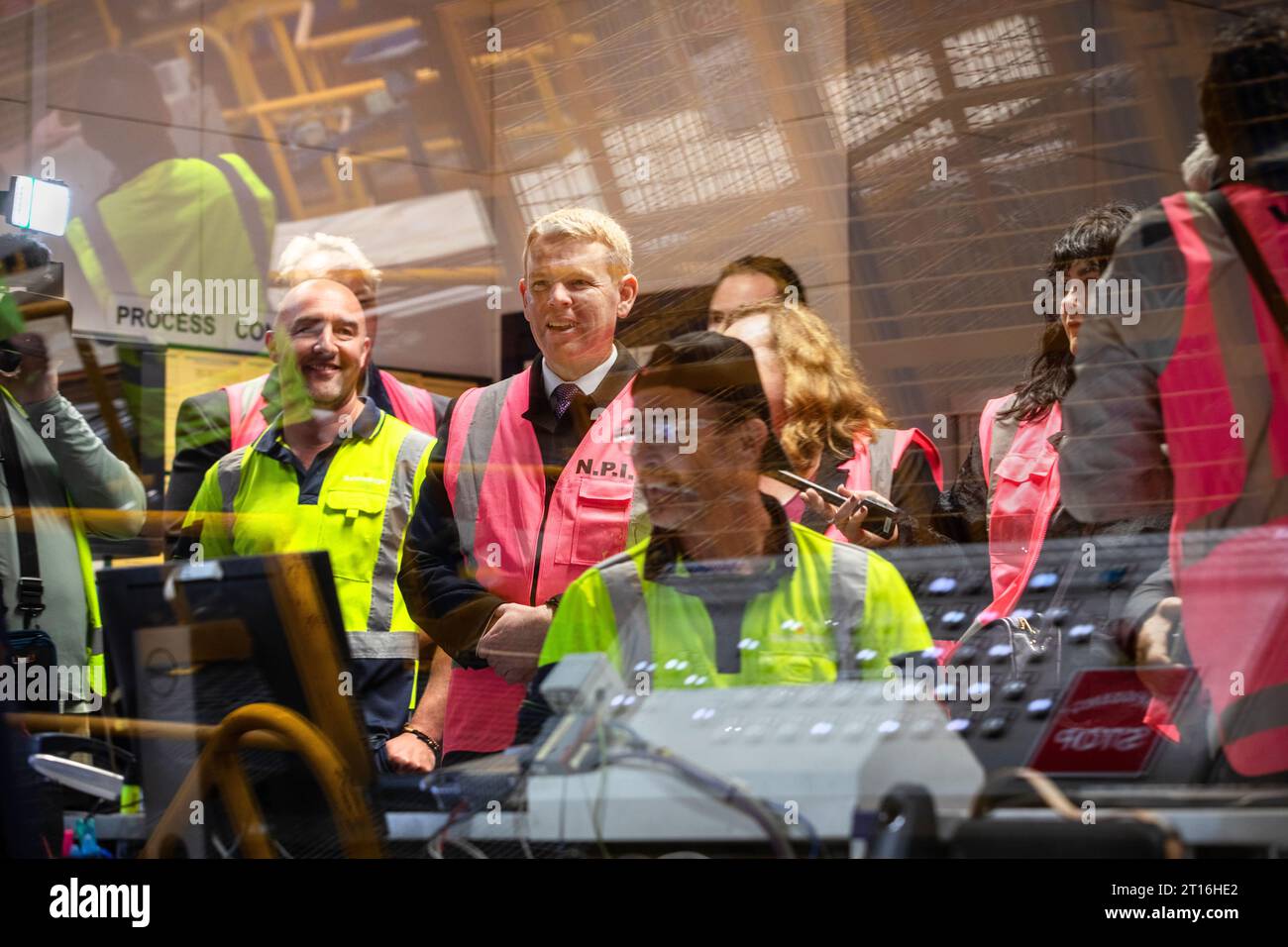 New Zealand Prime Minister Chris Hipkins campaigning before this month ...