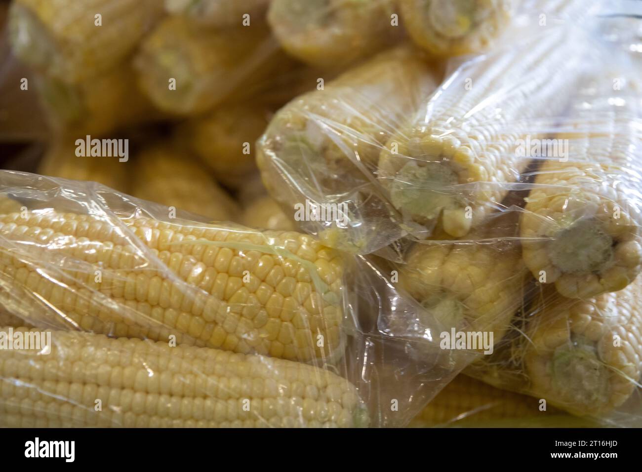 Bags of peeled corn in portioned bags Stock Photo - Alamy