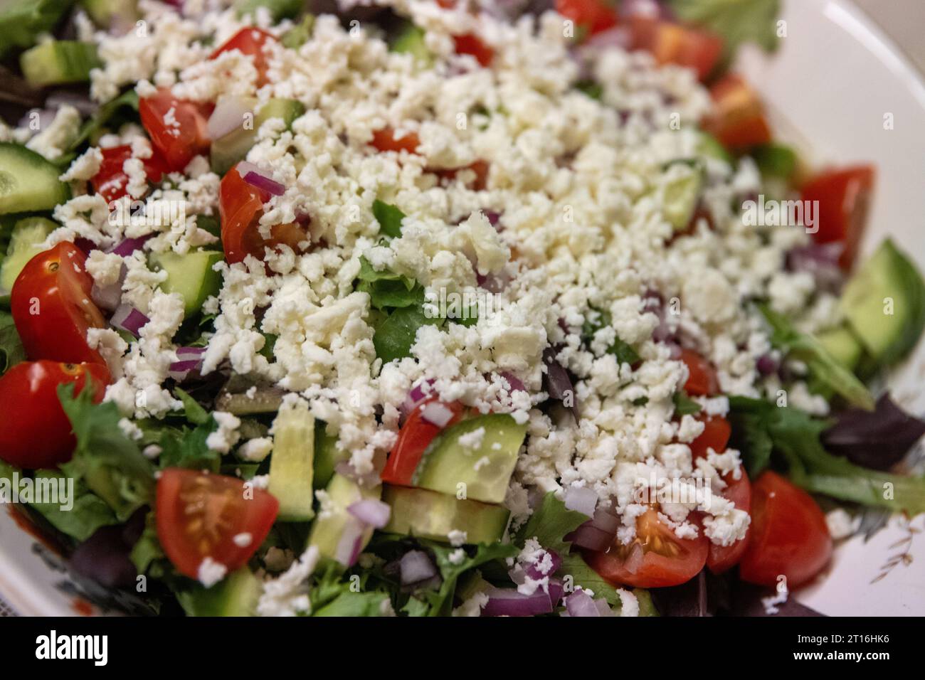 Greek Crisp Salad topped with Feta Cheese Stock Photo - Alamy