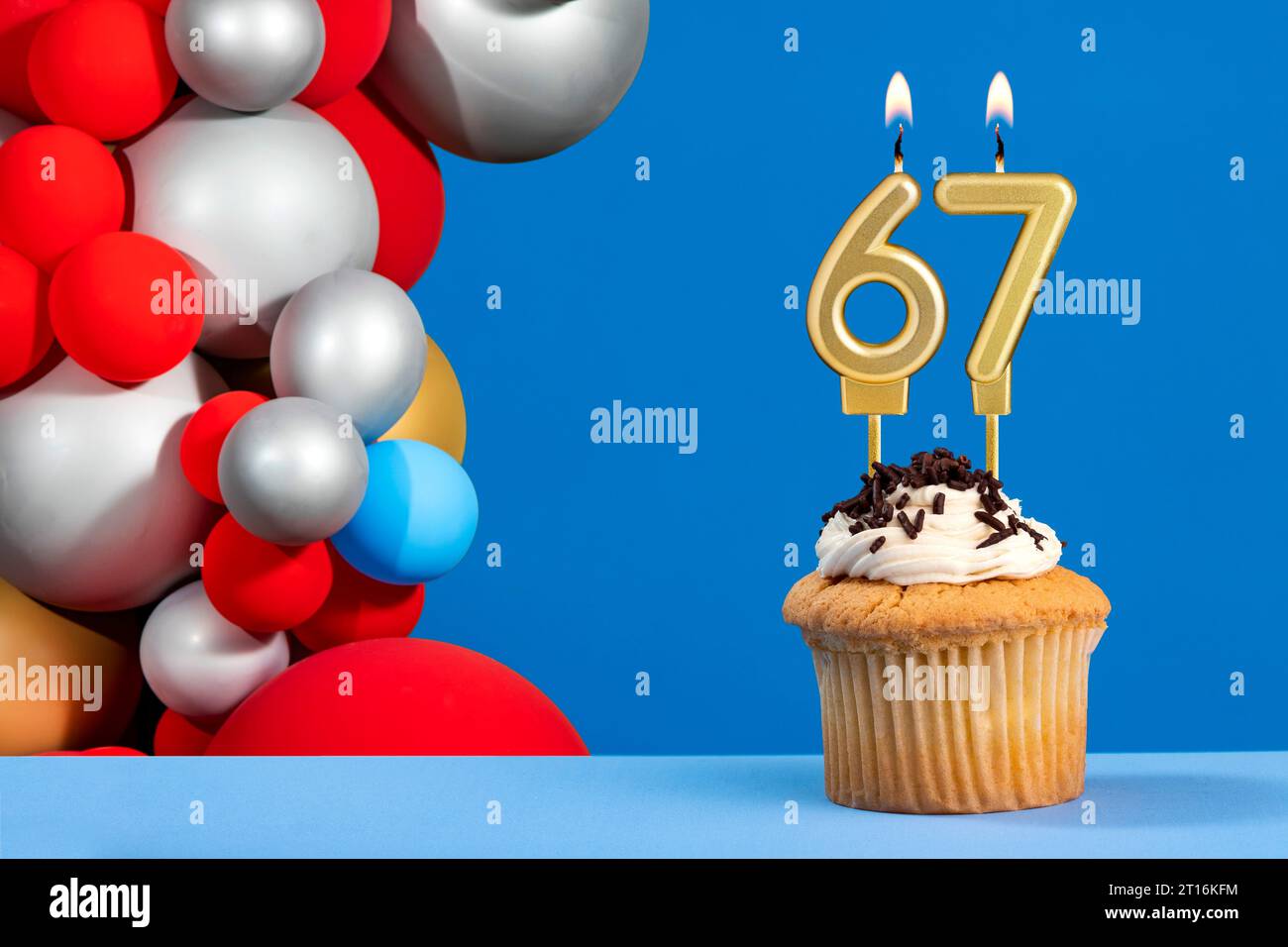 Number 67 birthday candle - Anniversary card with balloons Stock Photo ...